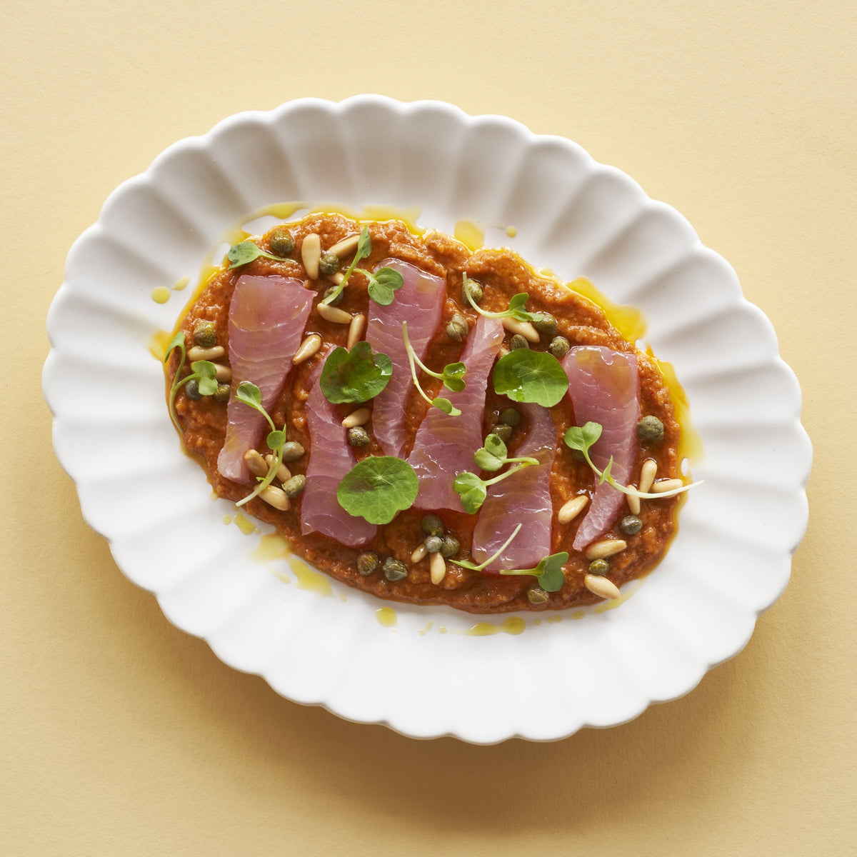 King Fish Crudo with Romesco Sauce – Sabato